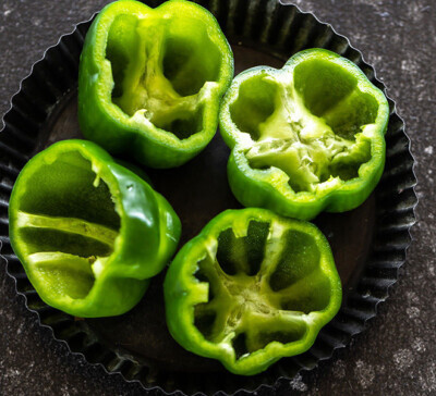 Bharwa Shimla Mirch (Spicy Potato Stuffed Bell Peppers) - Cook With Manali